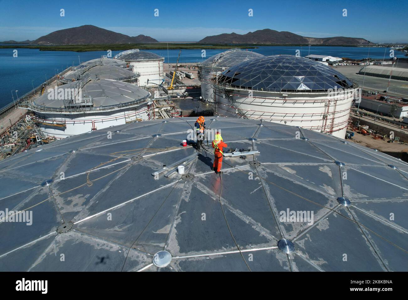 An aerial view of construction in industrial area near water Stock ...