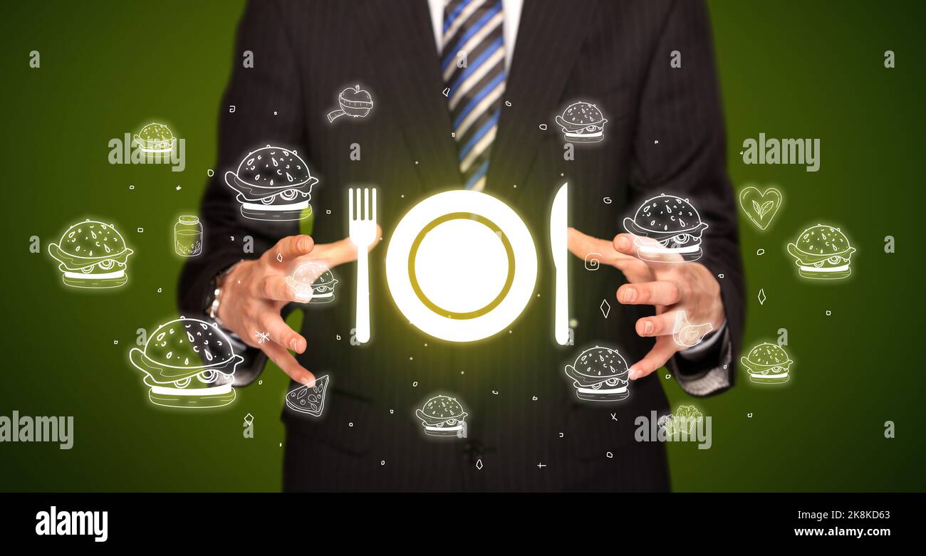 Hand holding food related icons Stock Photo - Alamy