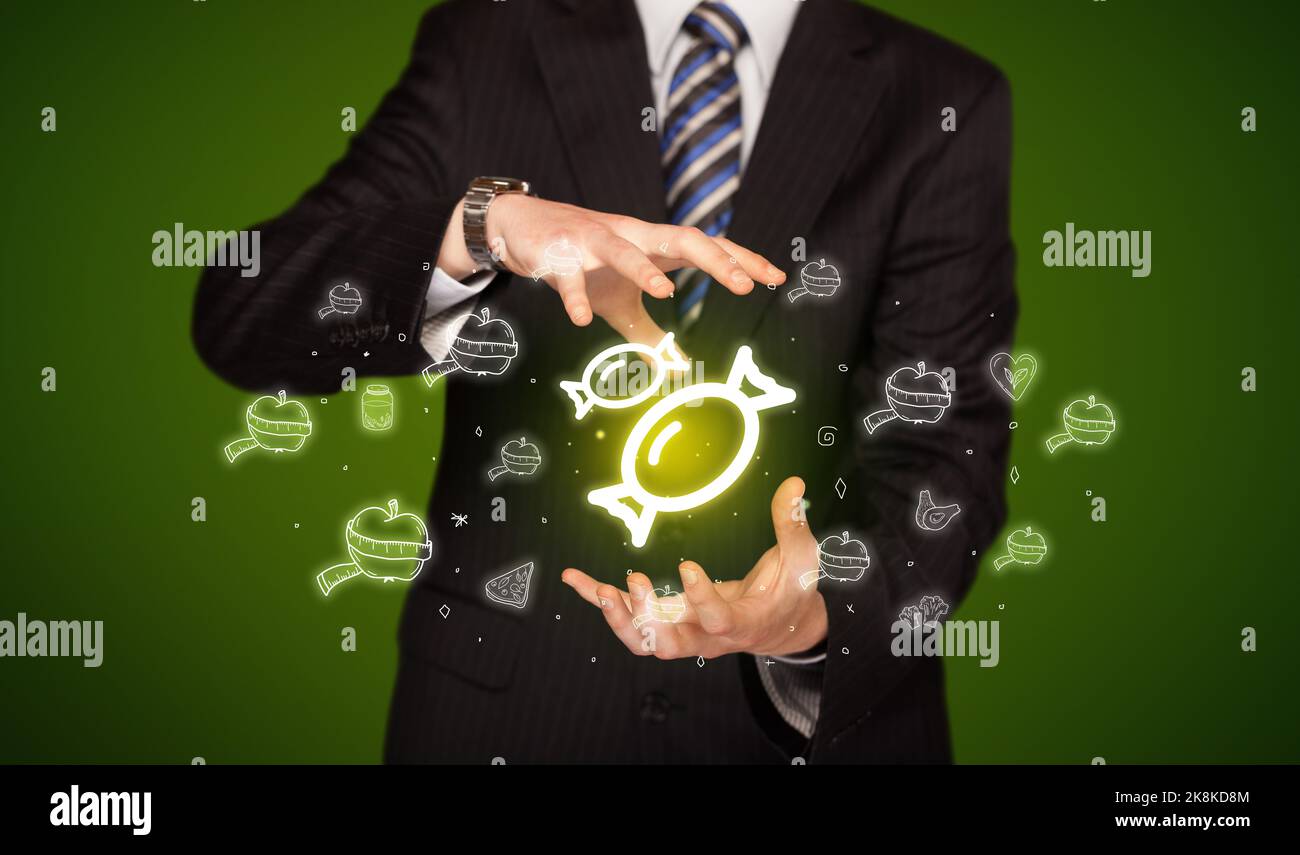 Hand holding food related icons Stock Photo - Alamy