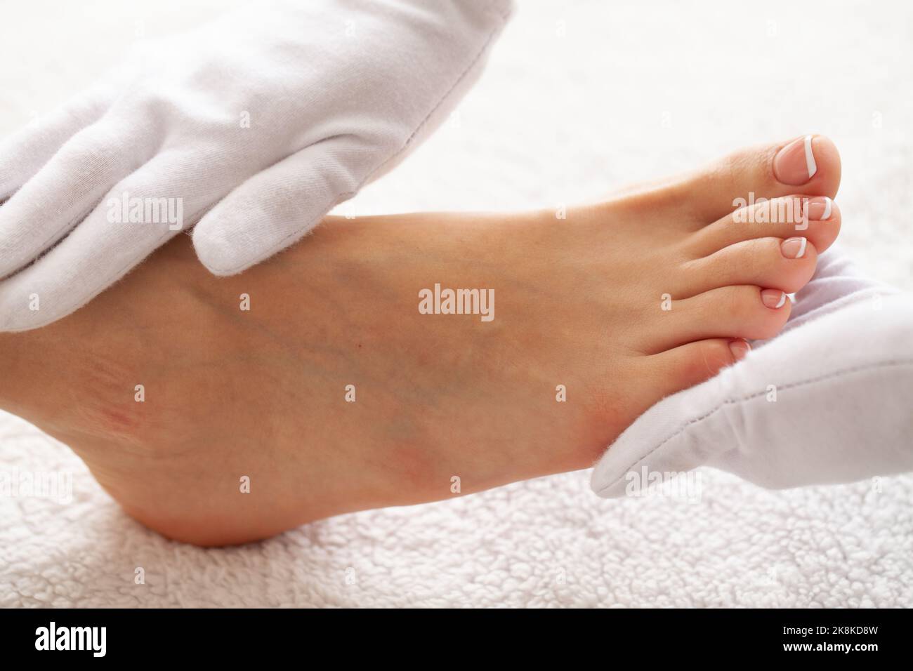 Hand and Nail Care. Beautiful Women's Feet with Pedicure in Beauty ...