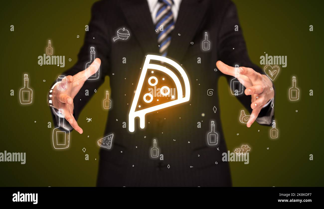 Hand holding food related icons Stock Photo - Alamy