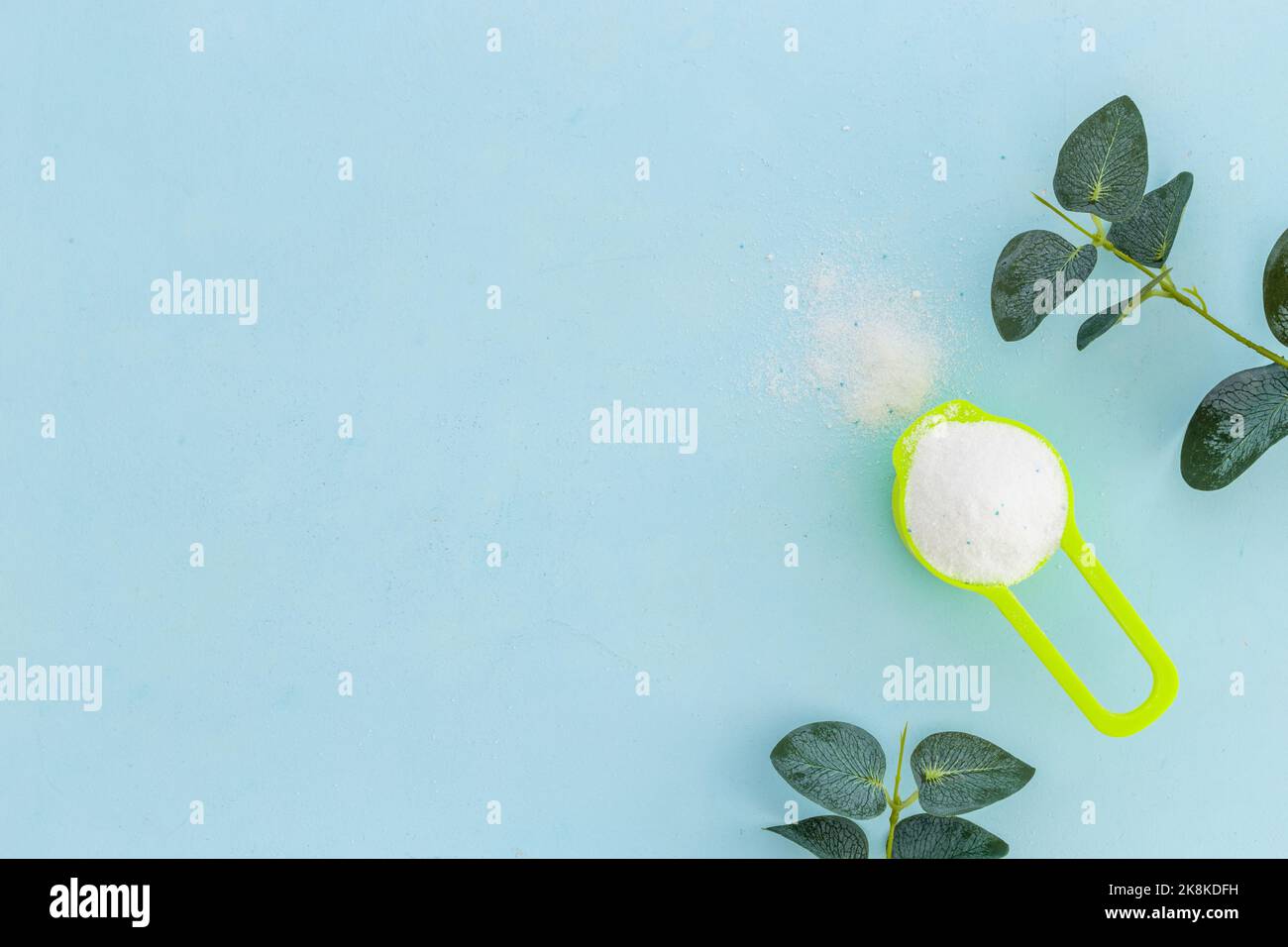 White laundry detergents powder with cup for laundry Stock Photo - Alamy