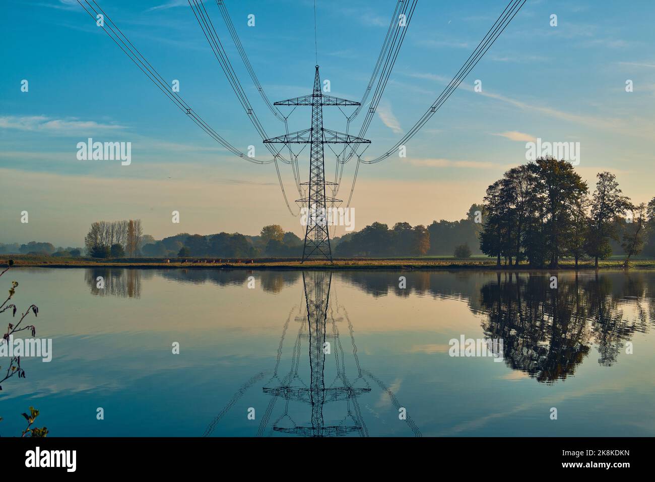 Power line reflection in lake. High quality photo Stock Photo - Alamy