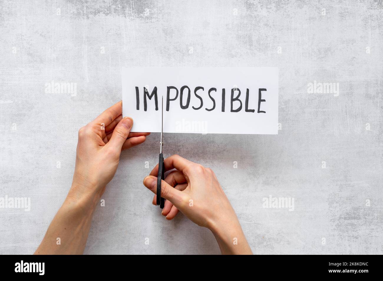 Word Impossible becomes Possible. Motivation concept Stock Photo - Alamy