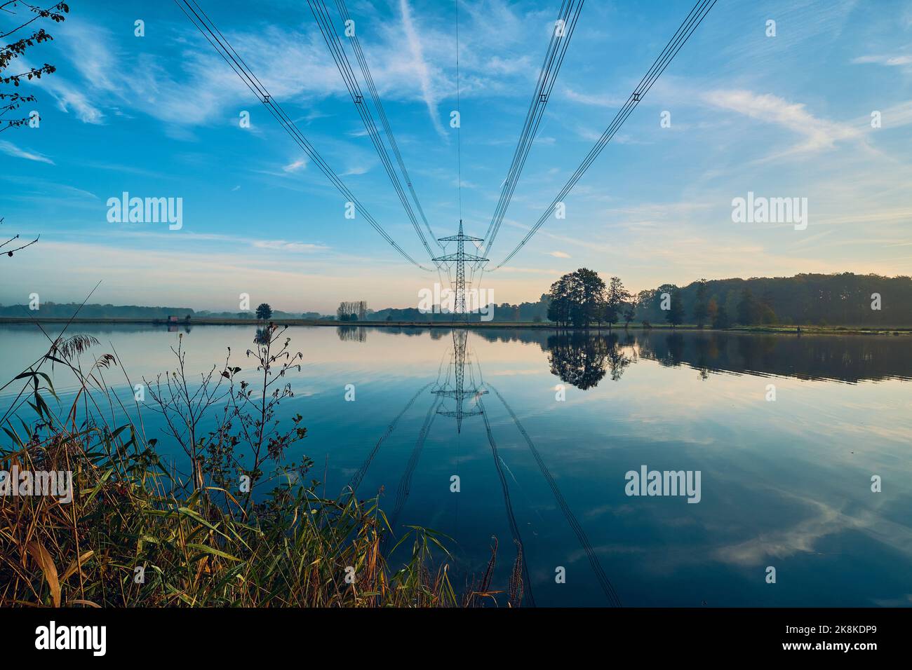 Power line over lake in northern Germany. High quality photo Stock ...