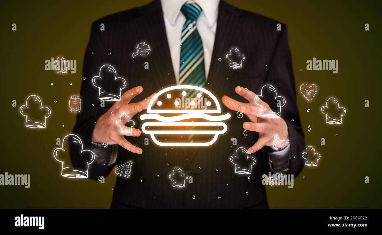 Hand holding food related icons Stock Photo - Alamy