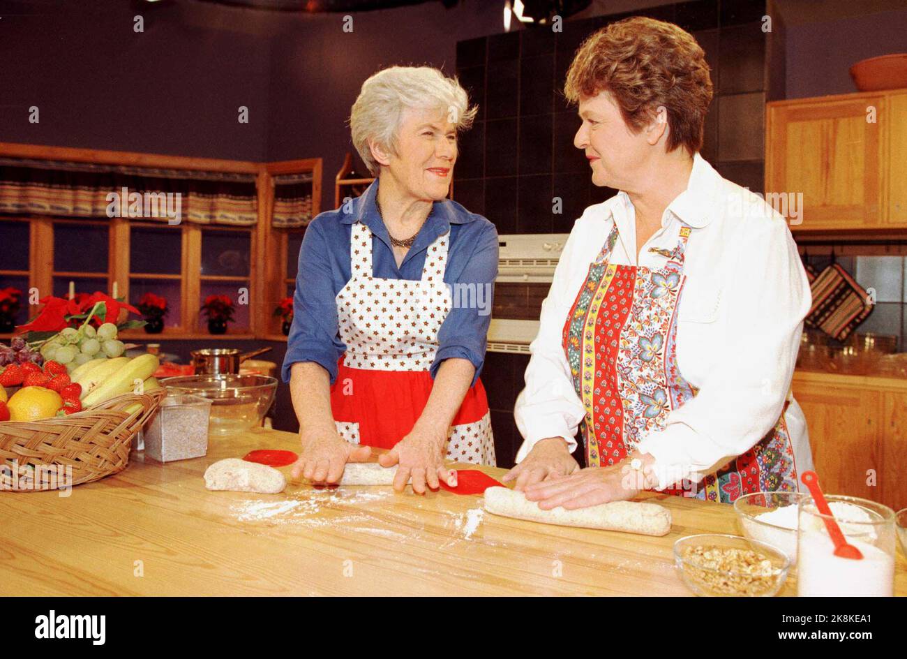 Wearing apron like two old fashioned housewives photo hi-res stock ...