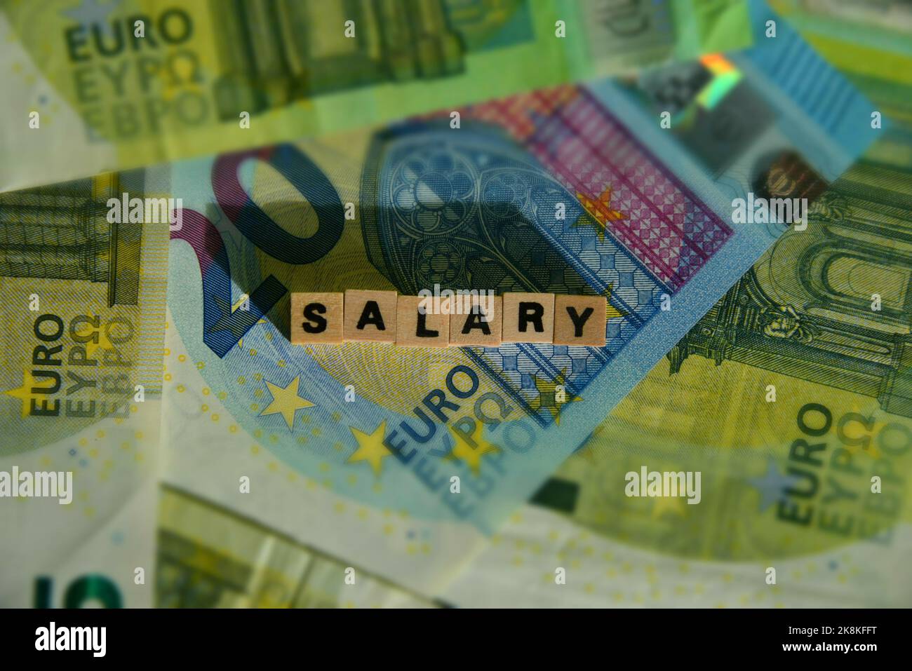 the word salary and euro bank notes Stock Photo - Alamy