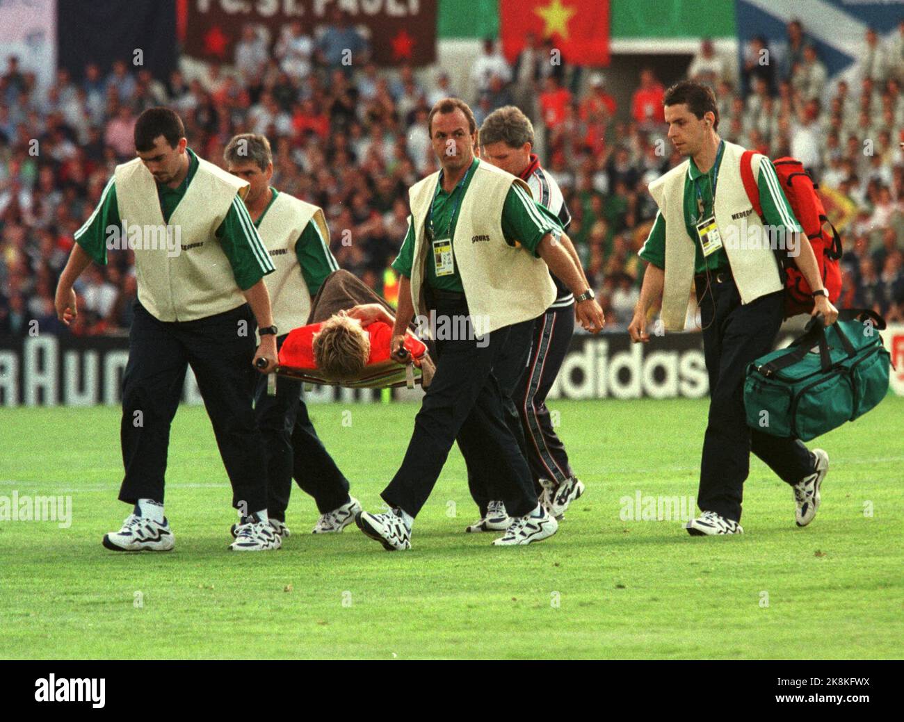 Football World Cup / Norway - Scotland. Vidar Riseth is carried off the ...