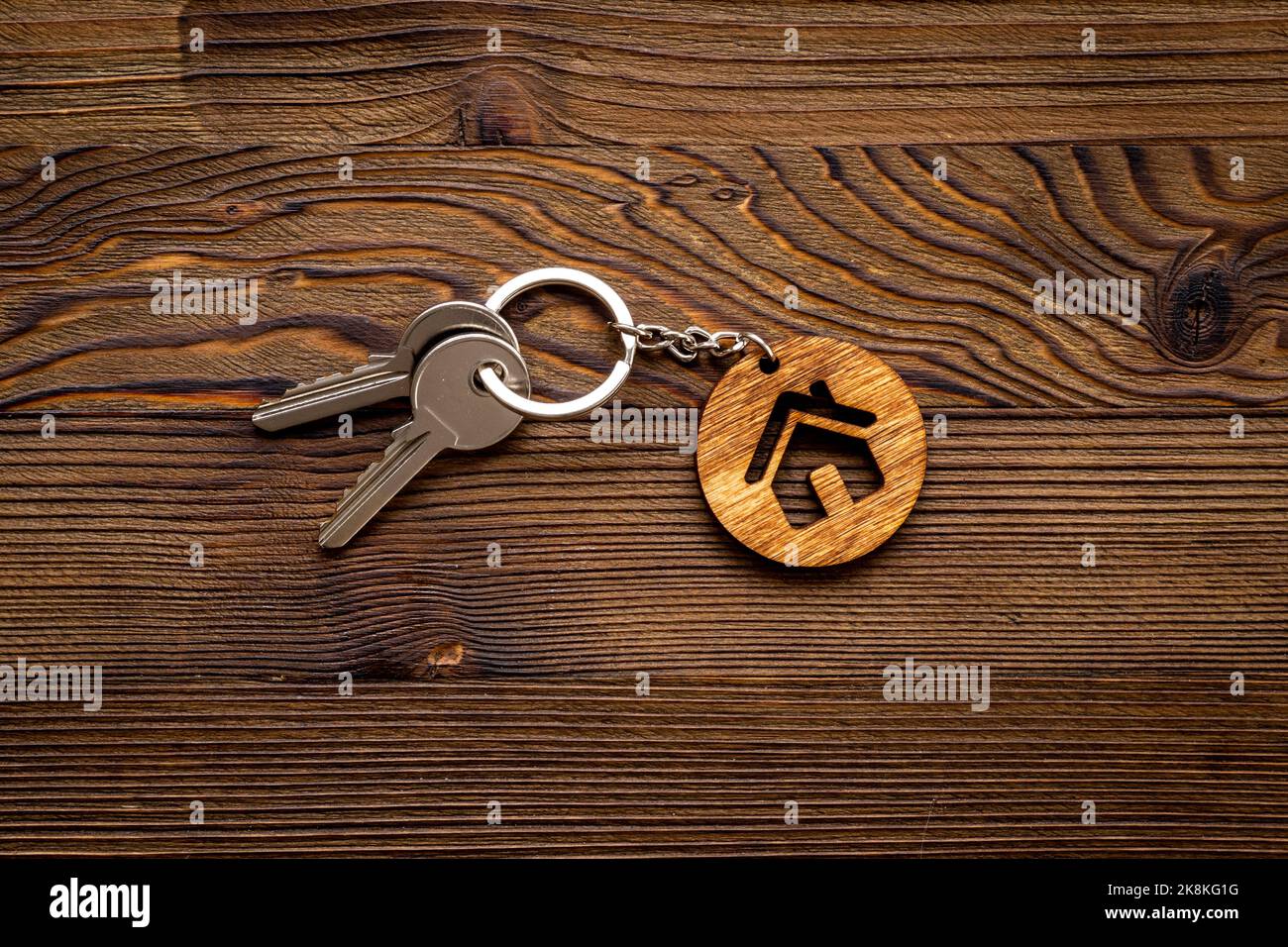 Sale or rent real estate concept. house shaped keychain and keys Stock ...