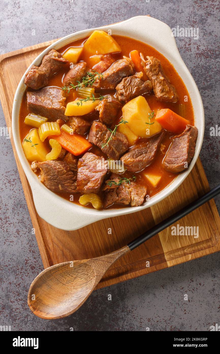 Irish Beef and Guinness Stew with seasonal vegetables closeup in the ...
