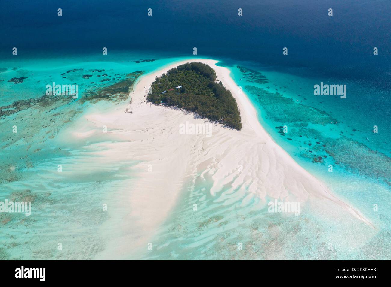 aerial view taken by drone of a Mnemba Island during a sunrise ...