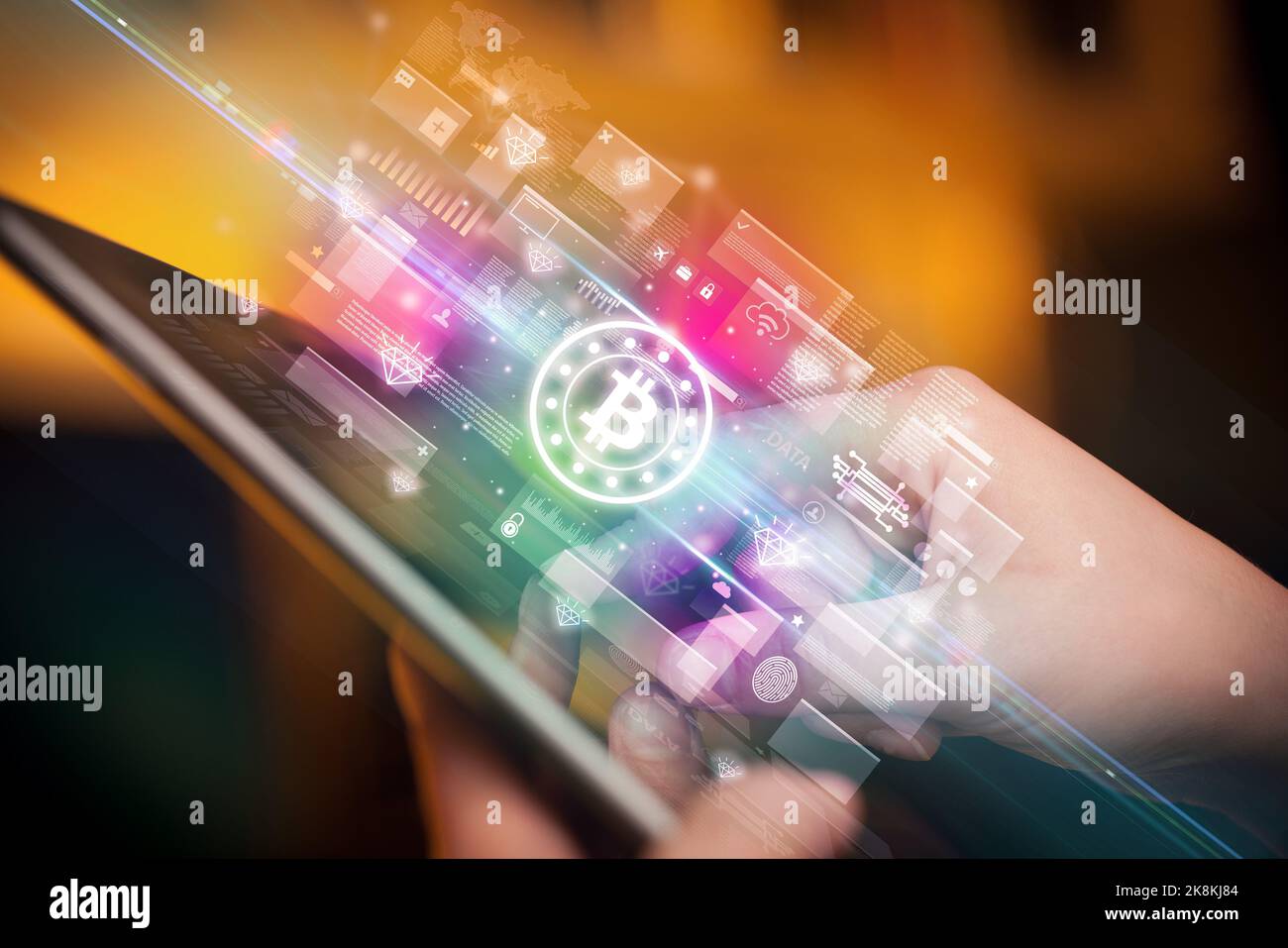 Close-up of a hand using tablet, currency concept Stock Photo - Alamy