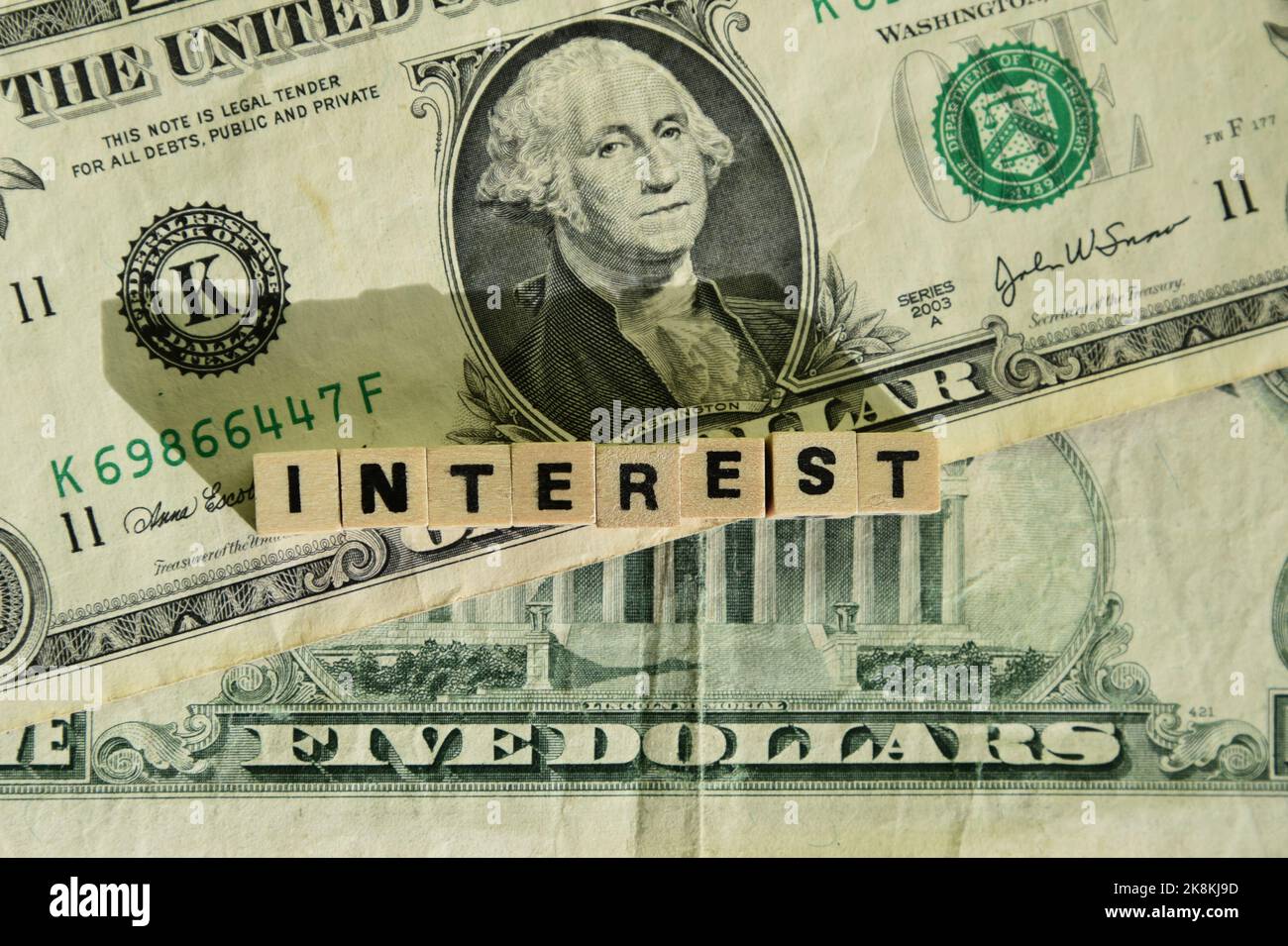 Interest and dollar notes Stock Photo - Alamy