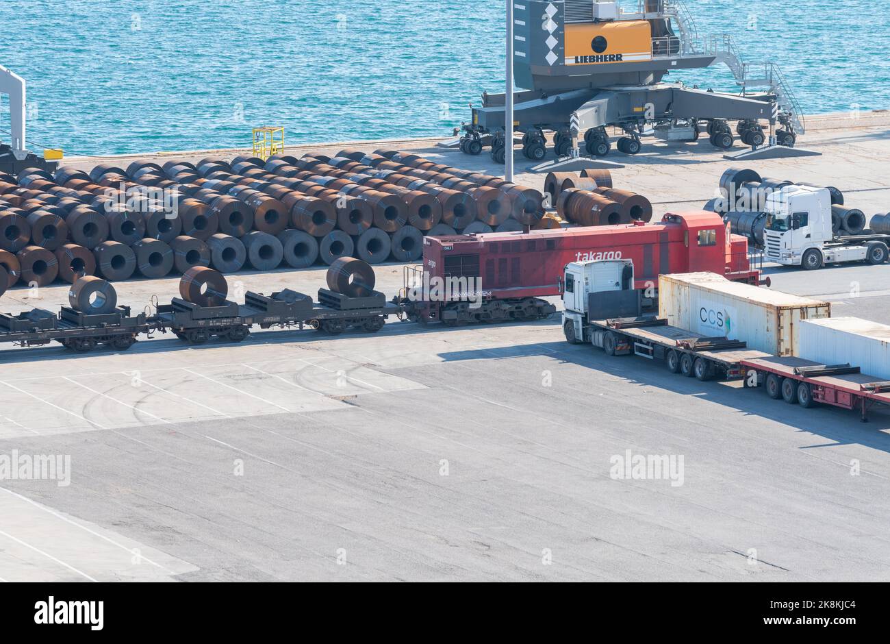 An aerial view of machineries and steel coils in the port of Setubal ...