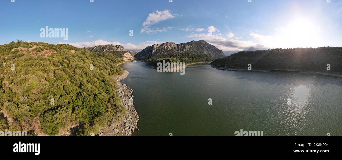 Stunning aerial view of the Cedrino Lake - Lago del Cedrino, surrounded ...