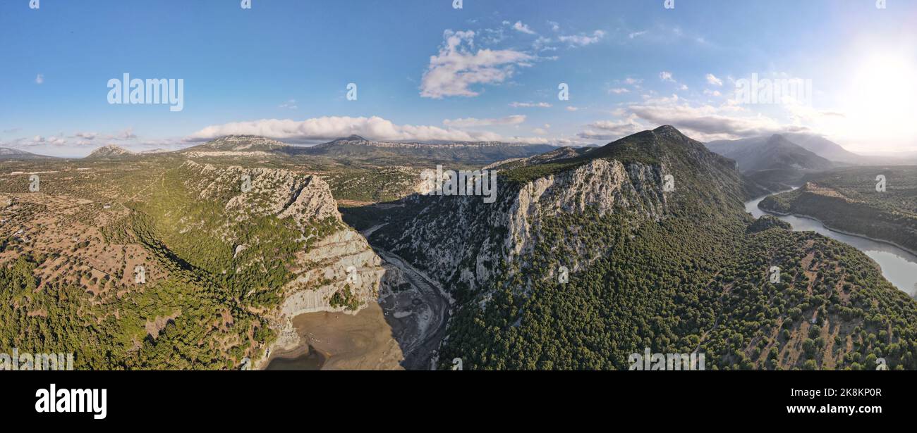 Stunning aerial view of the Cedrino Lake - Lago del Cedrino, surrounded ...