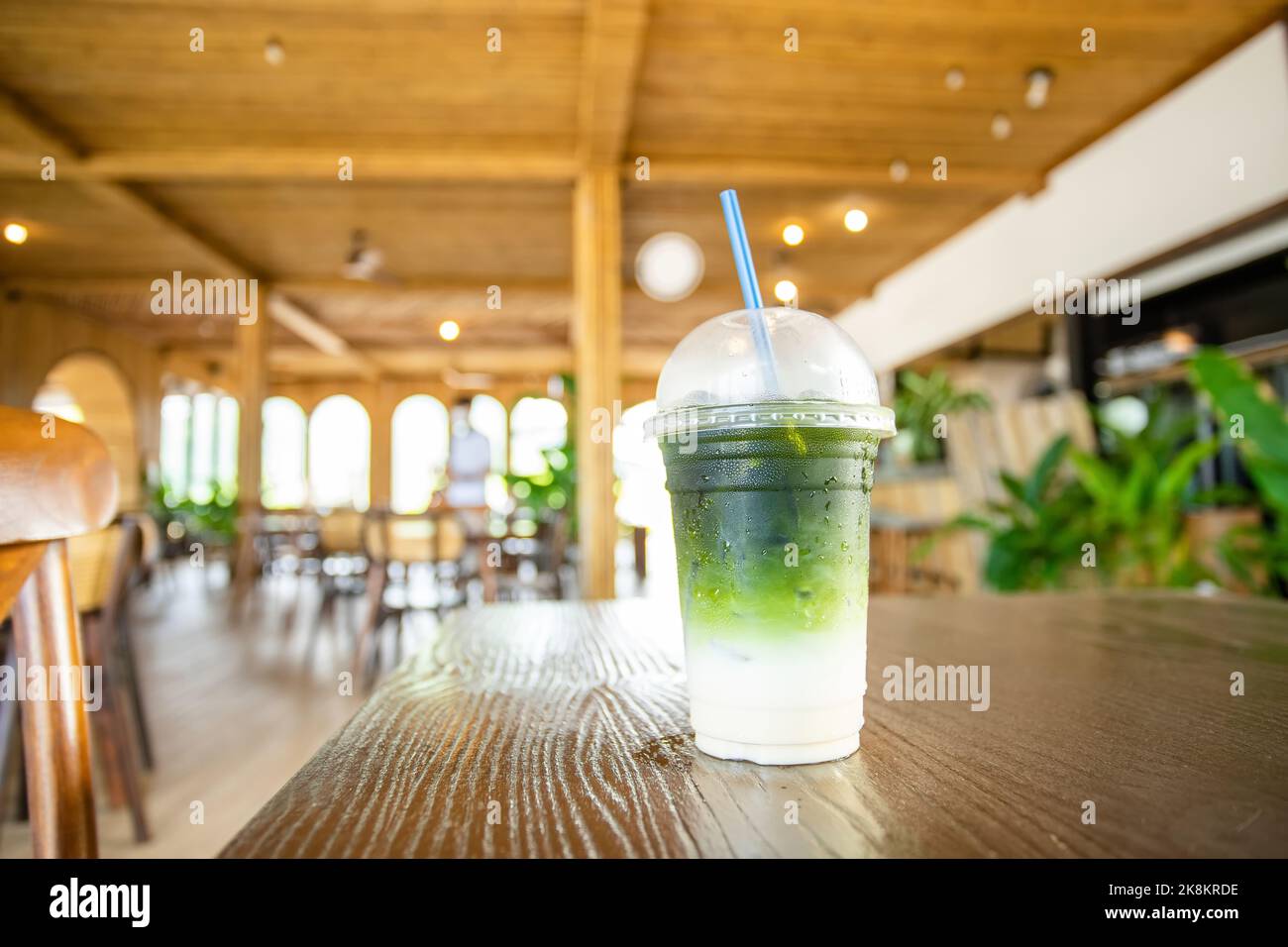 A cup of Iced green tea matcha Latte in the cafe Stock Photo - Alamy