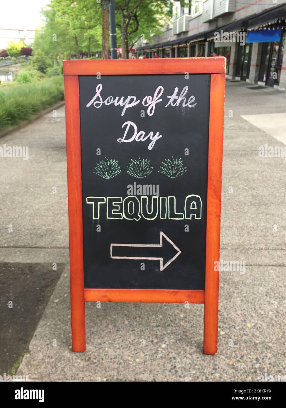 A restaurant signage on the chalkboard with a text soup of the day ...