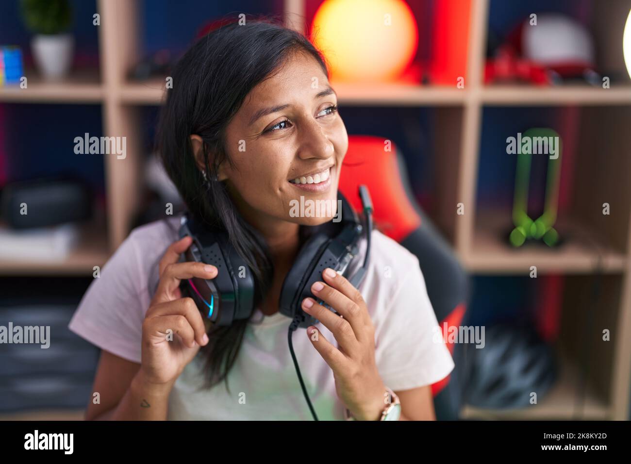 Young beautiful hispanic woman streamer smiling confident holding ...