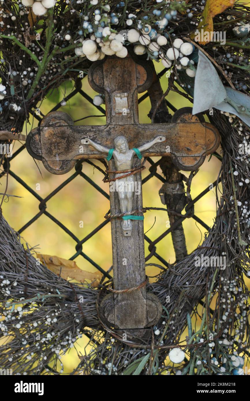 Ornate traditional cross marking a grave in the cemetery Stock Photo ...