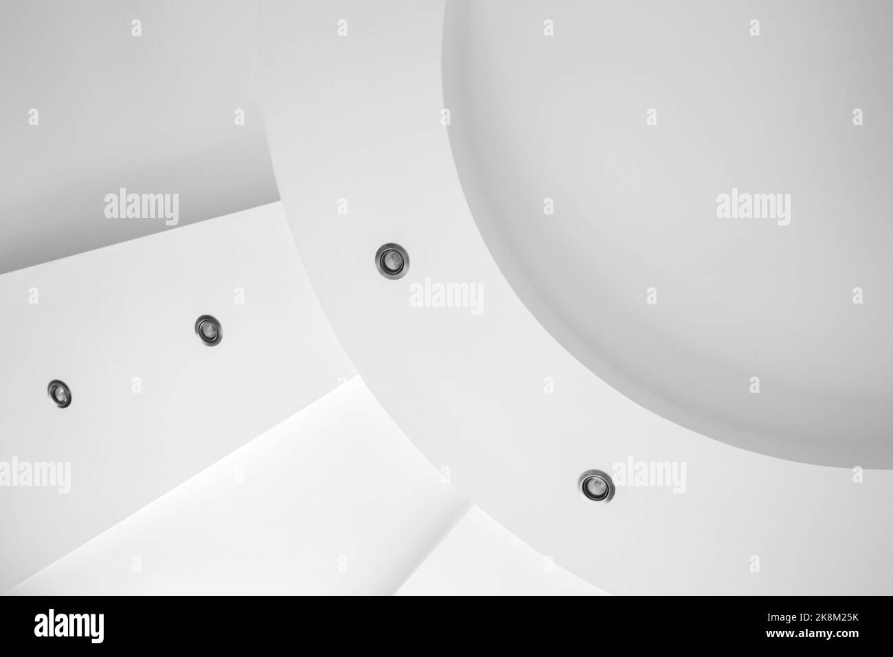 Abstract minimal architecture fragment with spot lights in white round ...