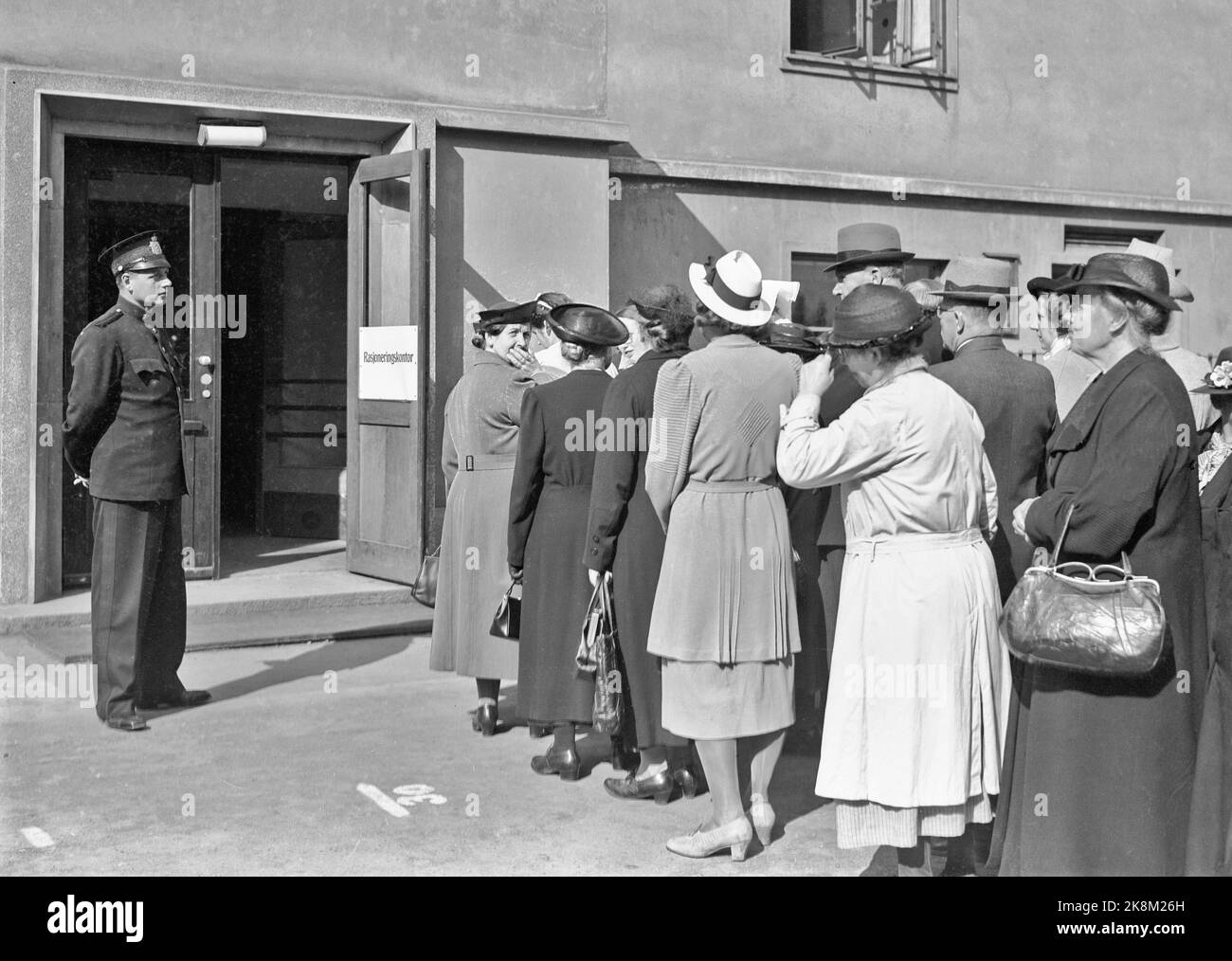 1940. Rationing during World War II. Here's queue for ration cards ...
