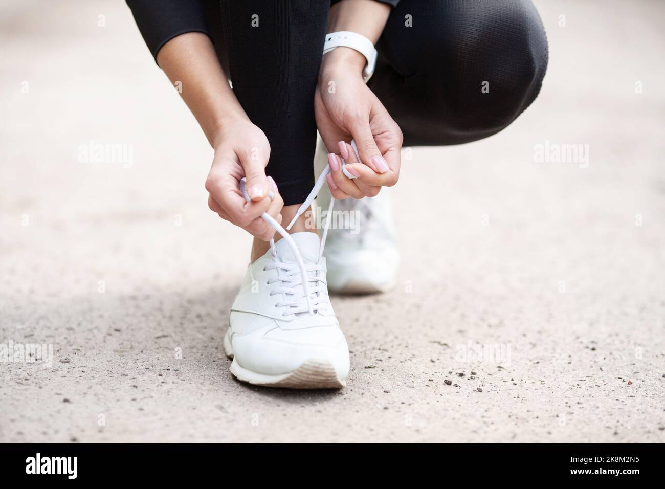 Sneakers Problem. Female Runner Tying Her Shoes Preparing For a jog ...