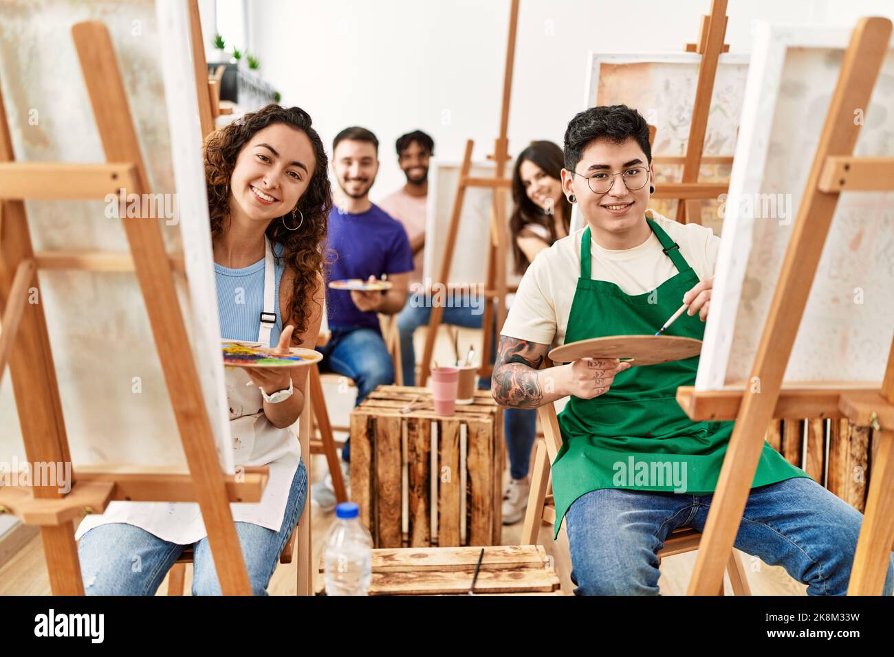 Group of draw students smiling happy drawing at art studio Stock Photo ...