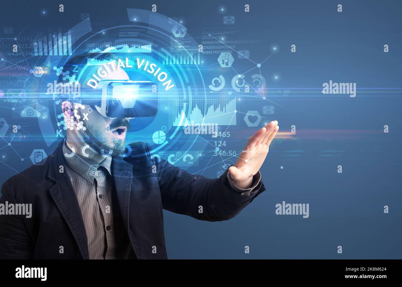 Businessman looking through VR glasses Stock Photo - Alamy
