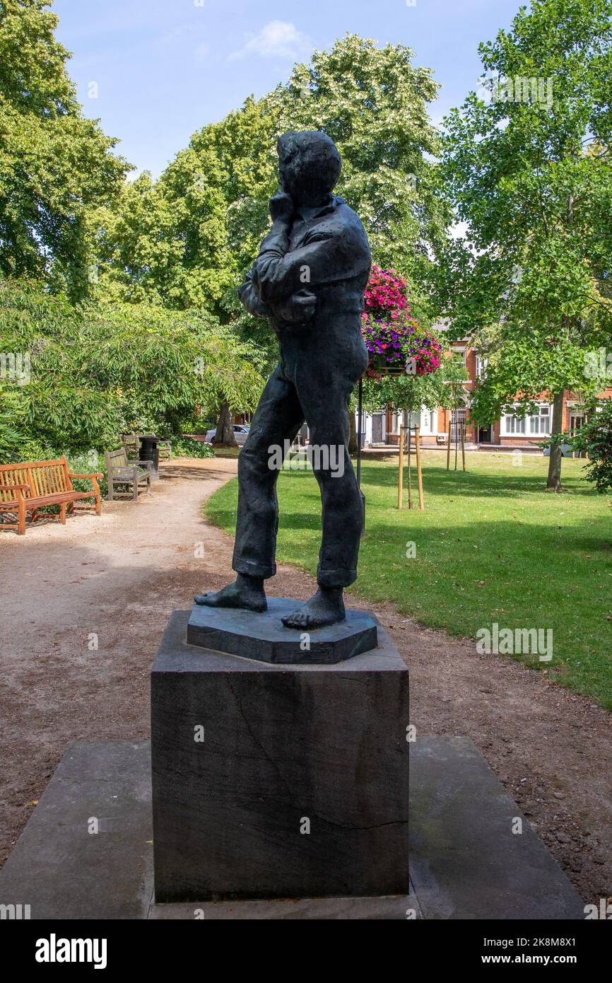 A vertical shot of the statue of the famous WW1 poet Rupert Brooke in a ...