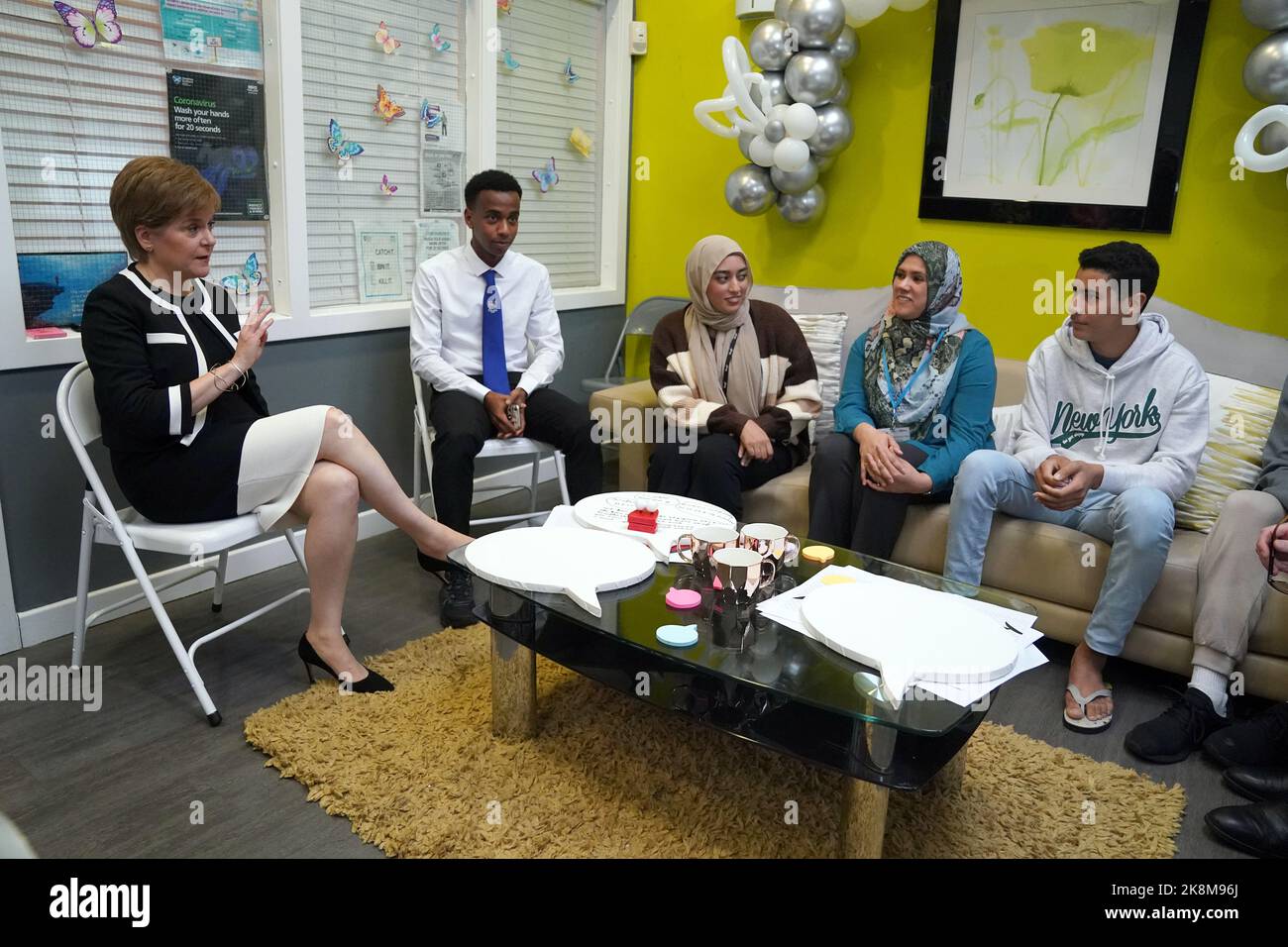 First Minister Nicola Sturgeon chats with young people and staff during ...