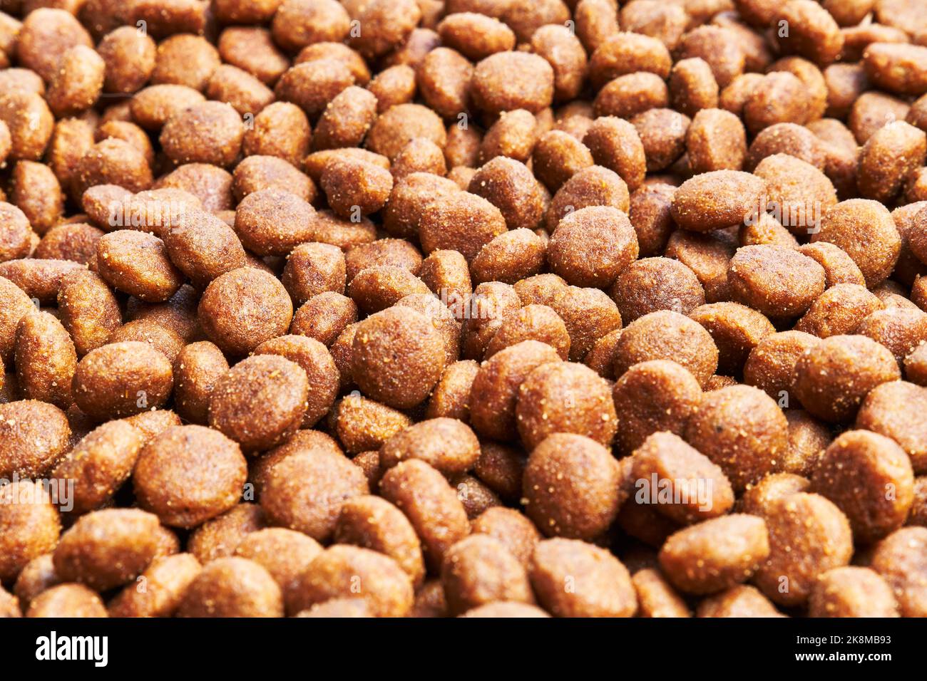 Delicious group of dog food balls texture Stock Photo - Alamy