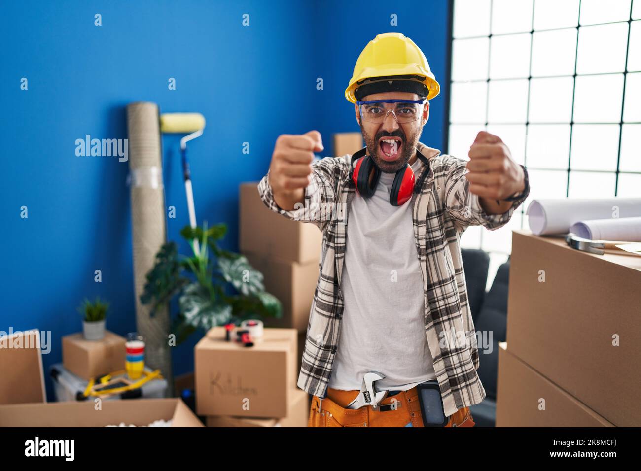 Construction worker raising fist hi-res stock photography and images ...