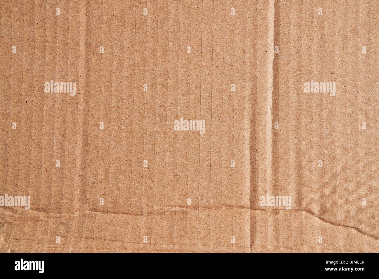 Brown cardboard carton material texture background Stock Photo - Alamy