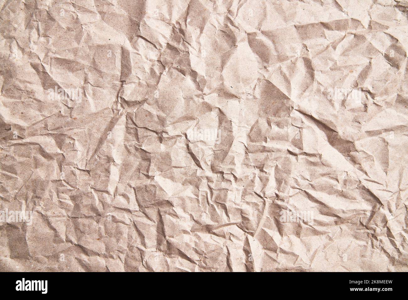 Brown crumpled paper texture background Stock Photo - Alamy