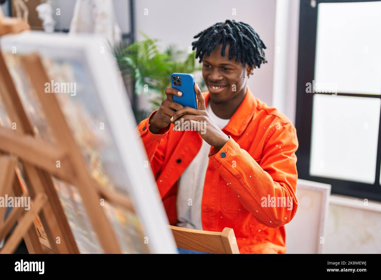 African american man artist smiling confident make picture by ...