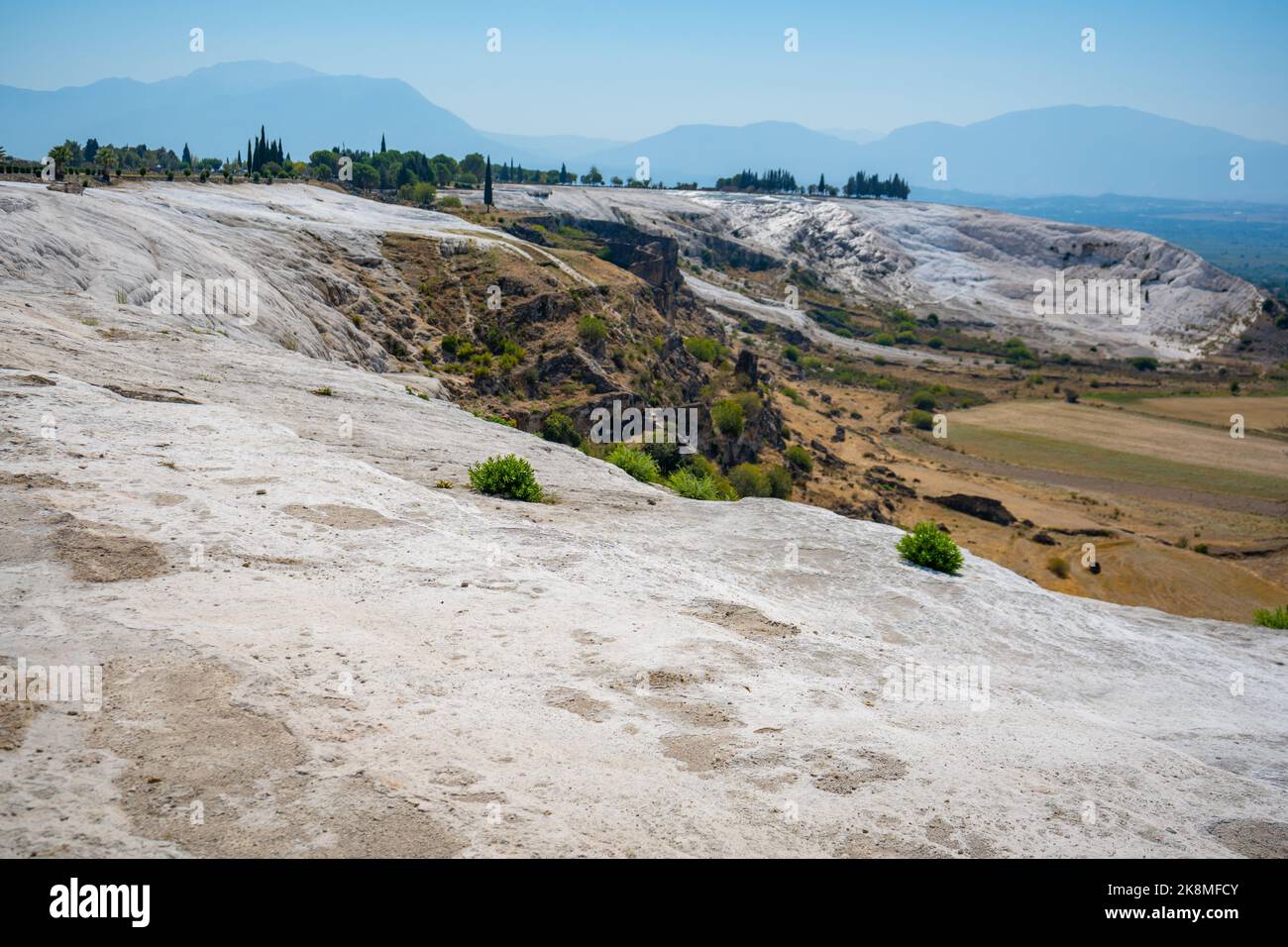 Calcite cliff of Pamukkale, white travertines in Turkey Stock Photo - Alamy