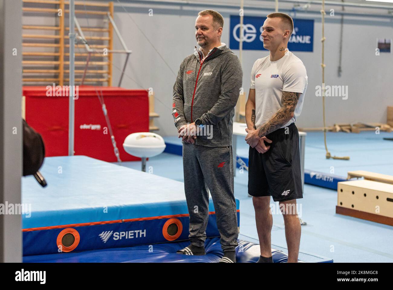 Croatian gymnast Aurel Benovic with his coach Vladimir Madjarevic ...