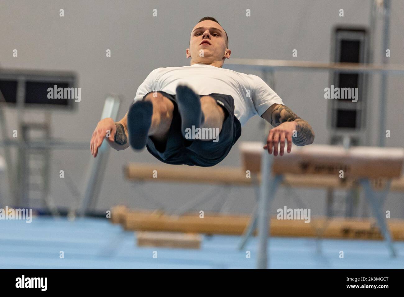Croatian gymnast Aurel Benovic show his skills before the press ...