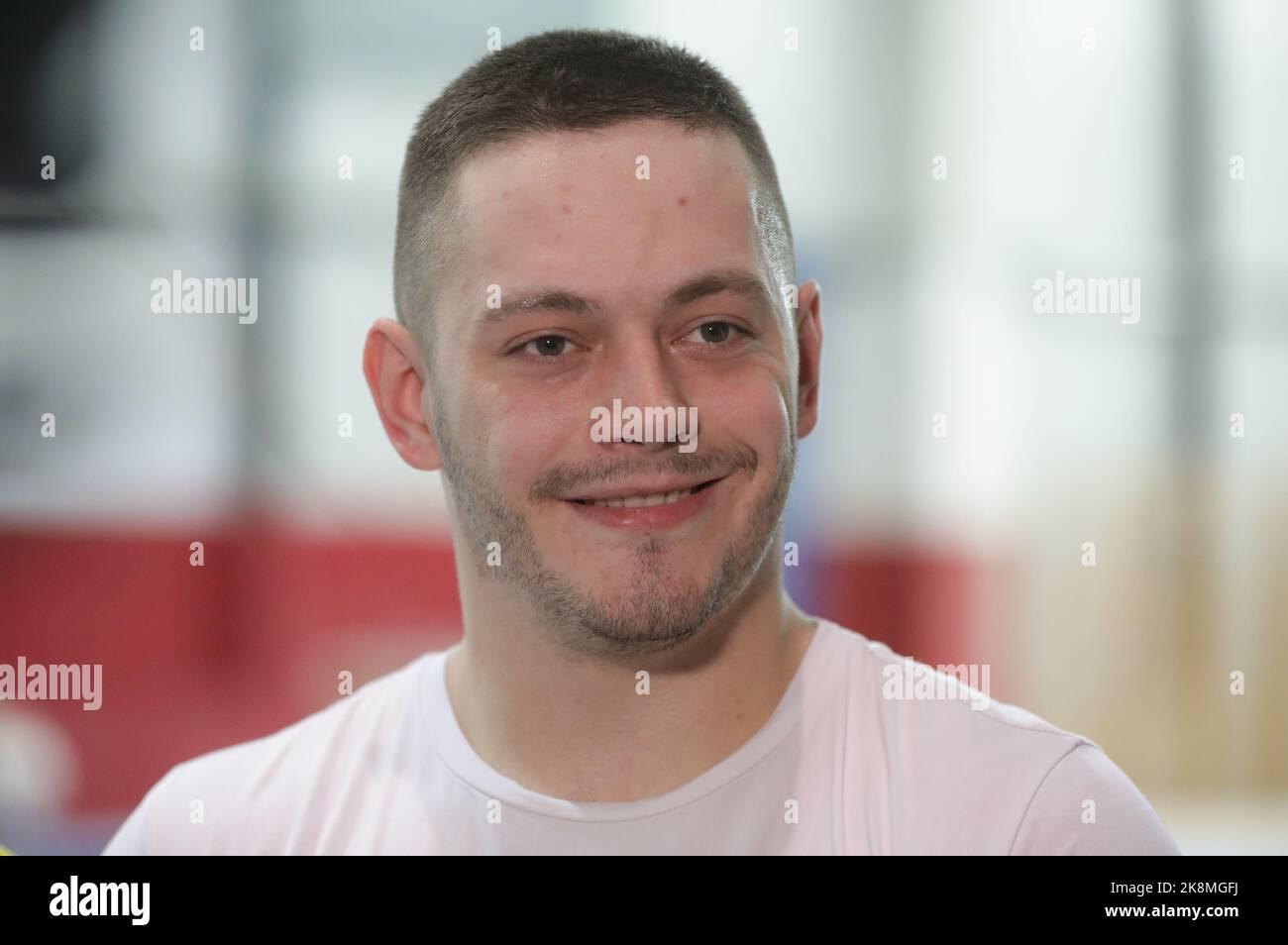 Croatian gymnast Tin Srbic speaks during a press conference ahead 2022 ...