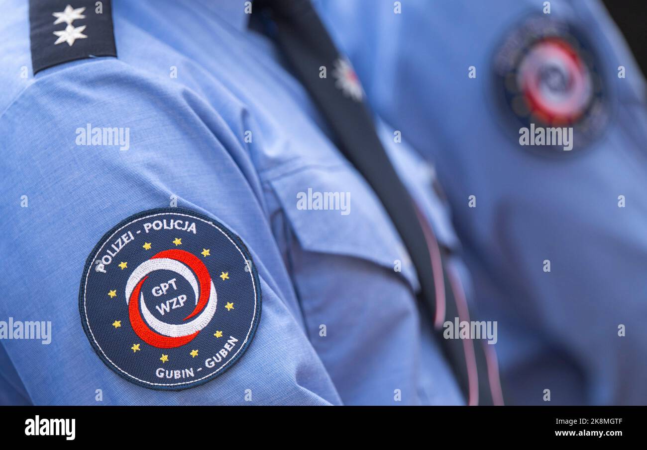 Guben, Germany. 24th Oct, 2022. Police officers wear the logo of the ...