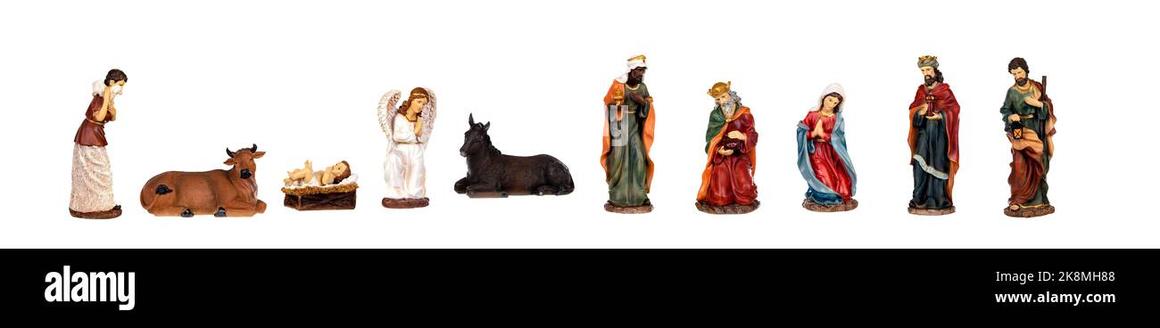 All the figures of the nativity scene lined up isolated on a white ...