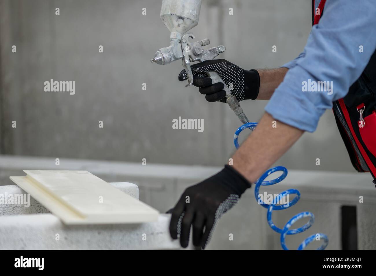 Person holding spray gun hi-res stock photography and images - Alamy