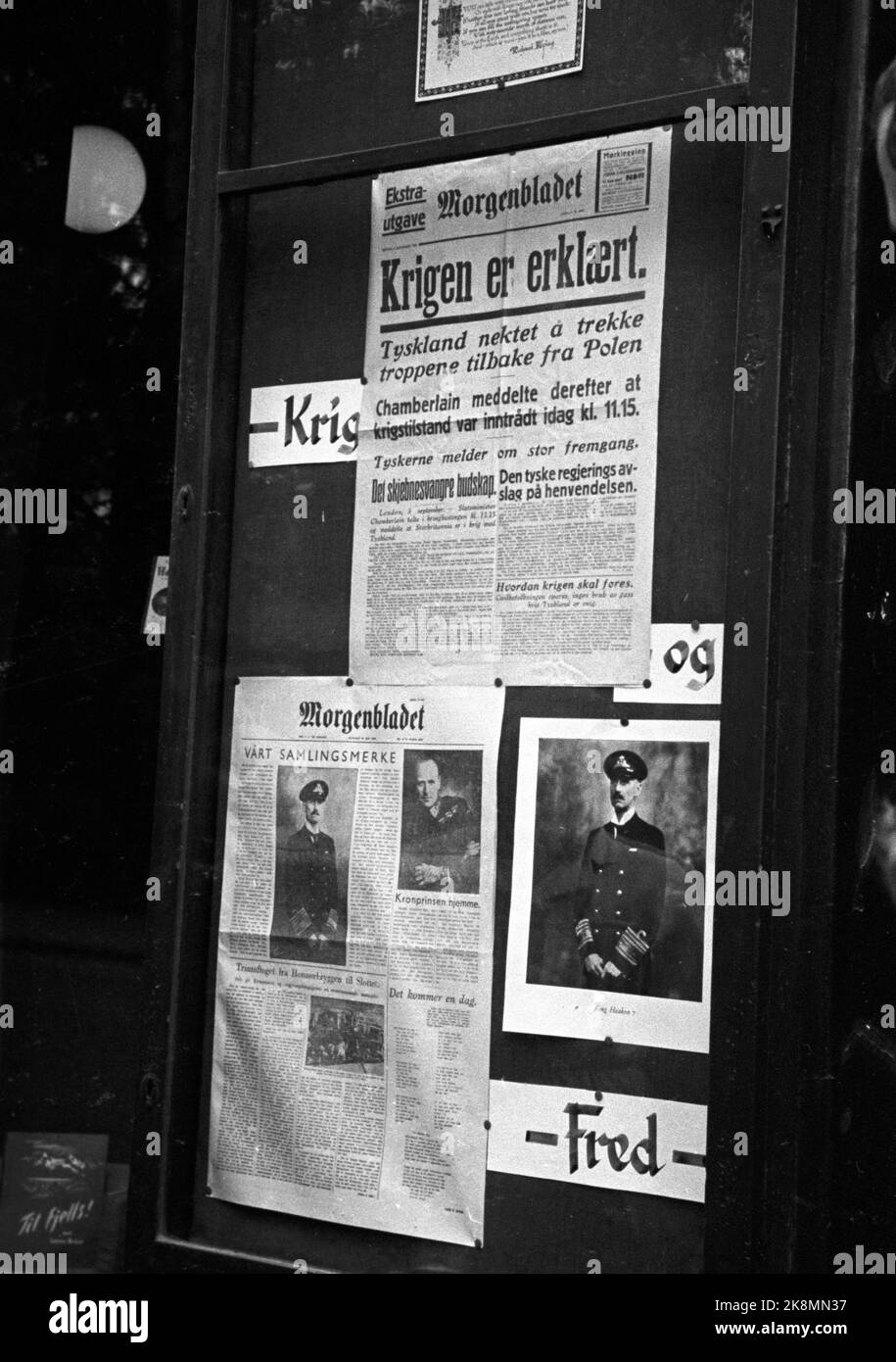 Oslo 19450514 Bookstore Olaf Norli, showcase. Avis from the start of ...