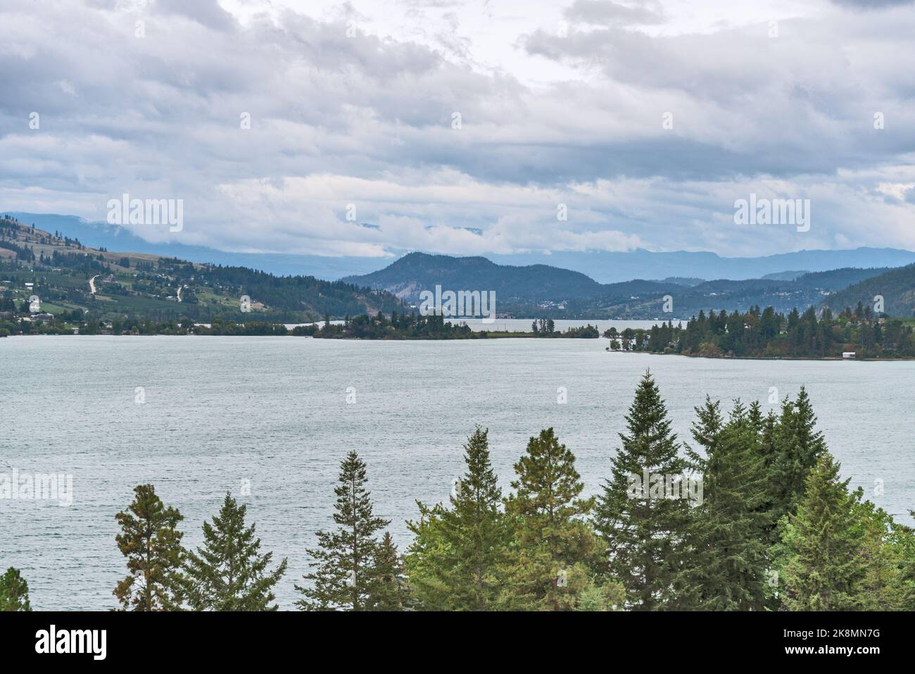 Kalamalka lake overview with mountatins and cloudy sky background Stock ...