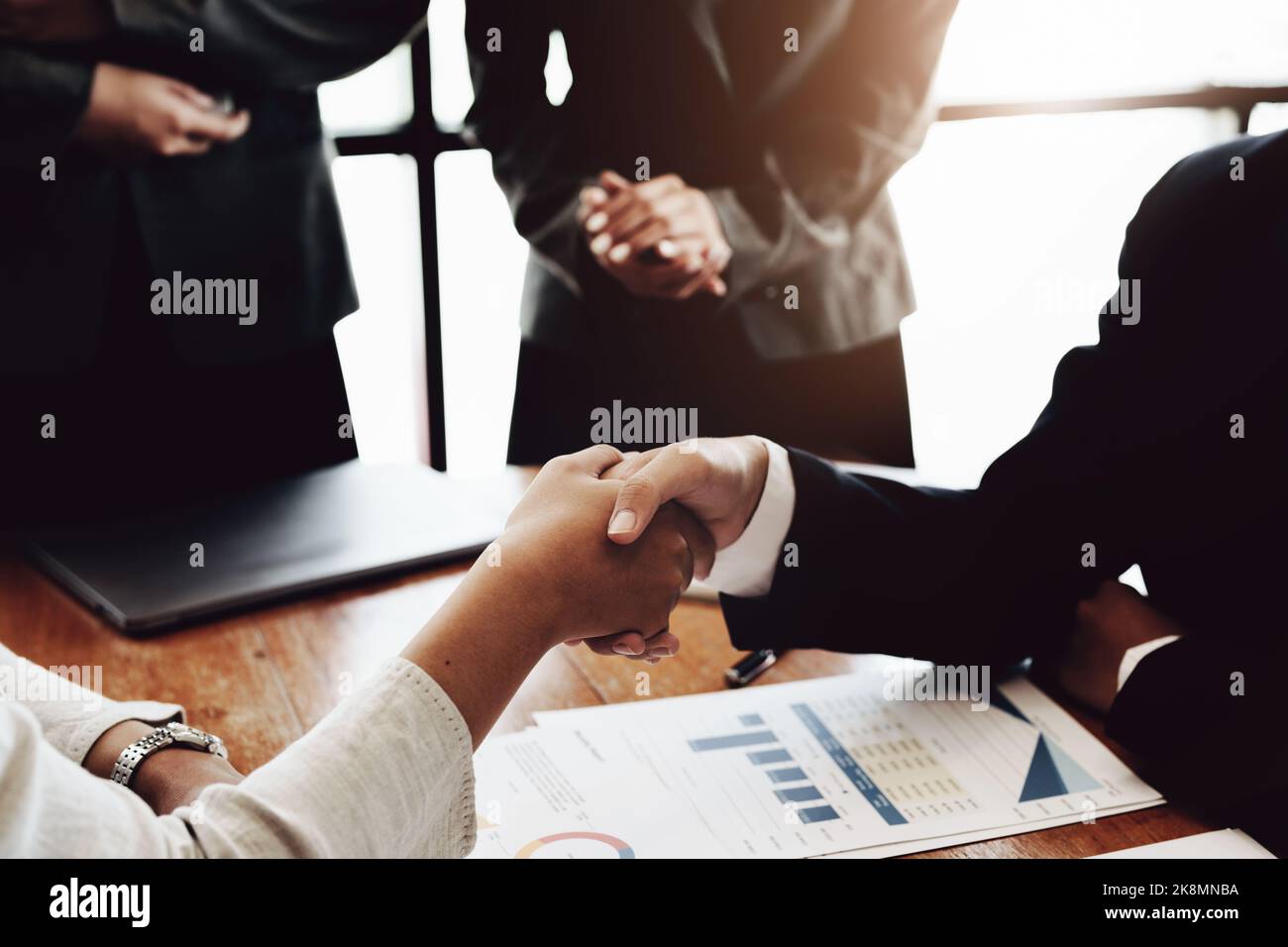 The handshake symbolizes the merger, together concept Stock Photo - Alamy