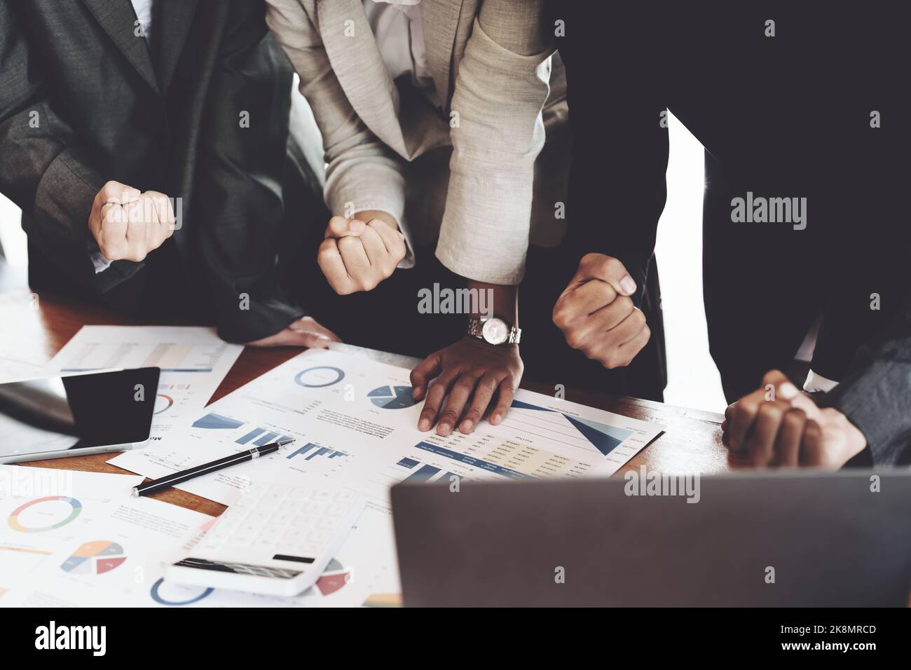 Businesspeople showing success with sales, teamwork concept Stock Photo ...