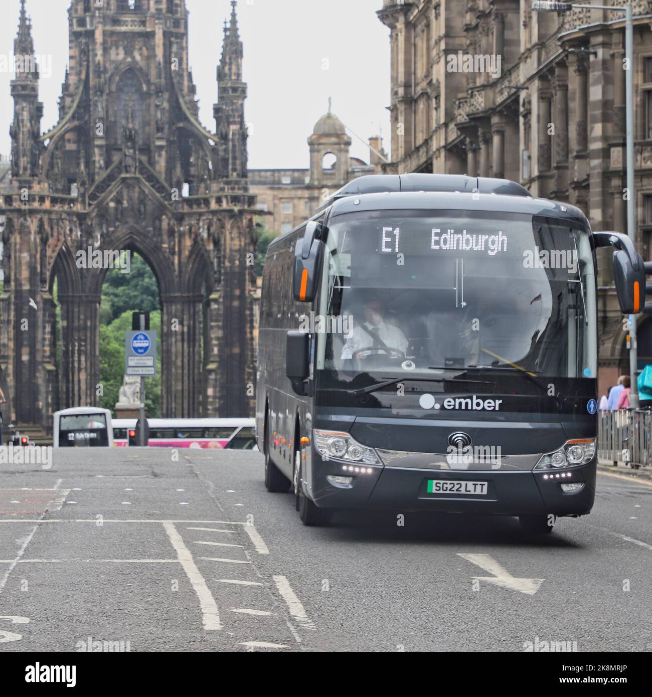Ember electric intercity coach with Scott Monument Edinburgh Scotland ...