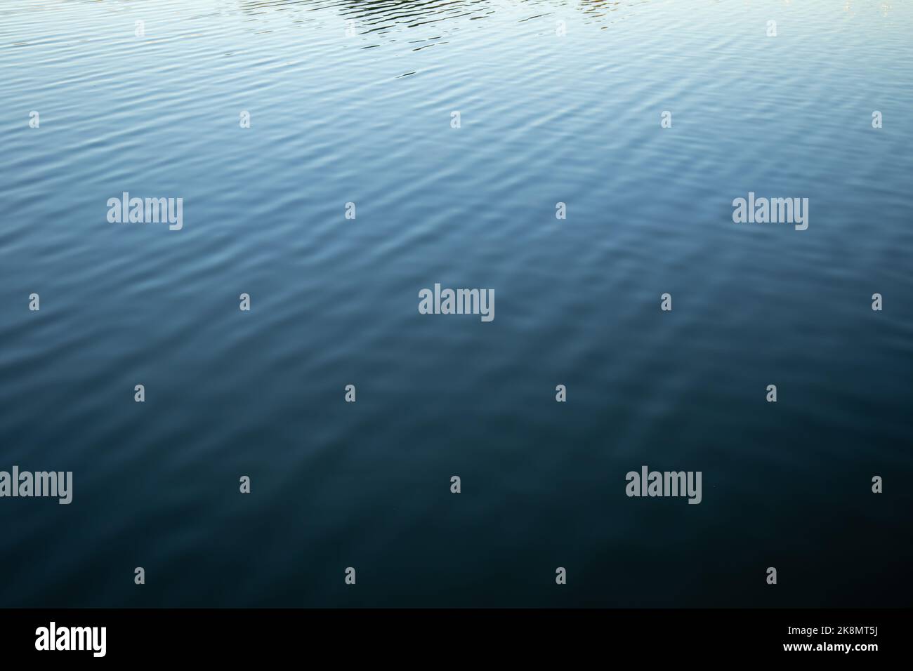 Natural background, water texture on the lake Stock Photo - Alamy